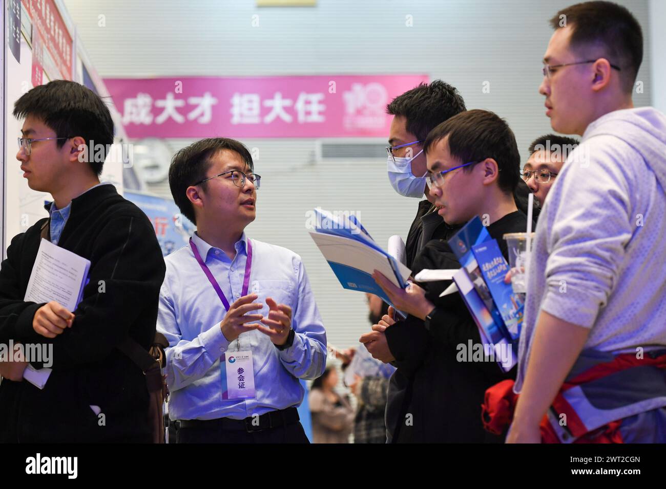Beijing, China. 15th Mar, 2024. Students inquire about job ...