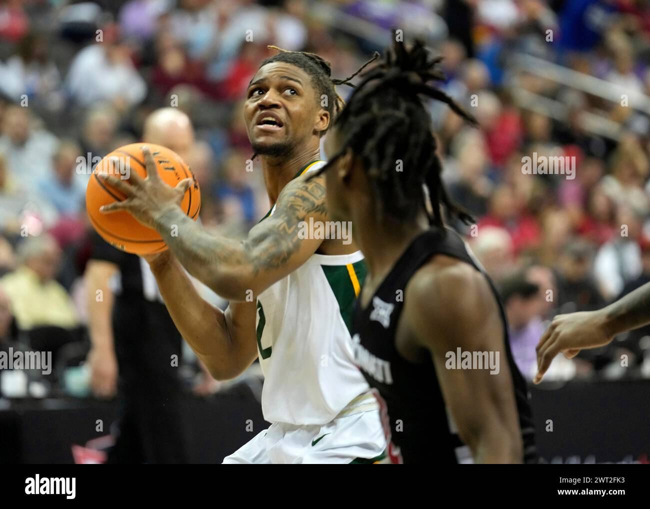 MAR 14 2024: Baylor Bears guard Jayden Nunn (2) looks for a passing ...