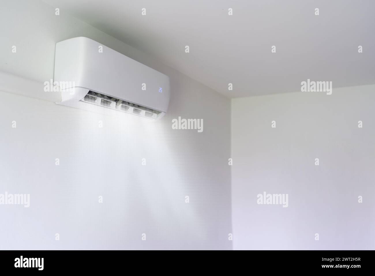 Air conditioner and wind flow on white wall background Stock Photo - Alamy