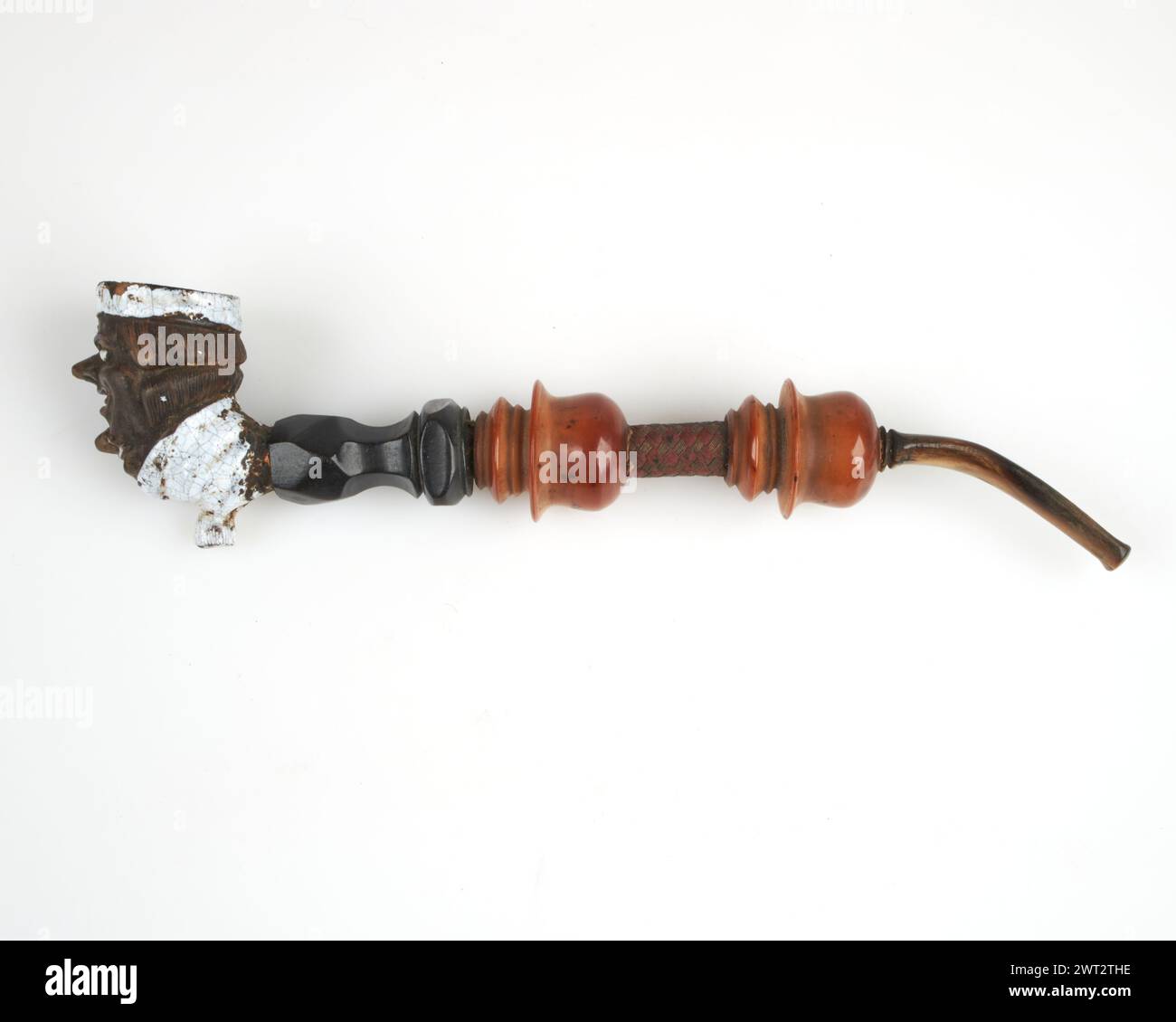 Antique double face enamelled pottery smokers pipe Stock Photo - Alamy