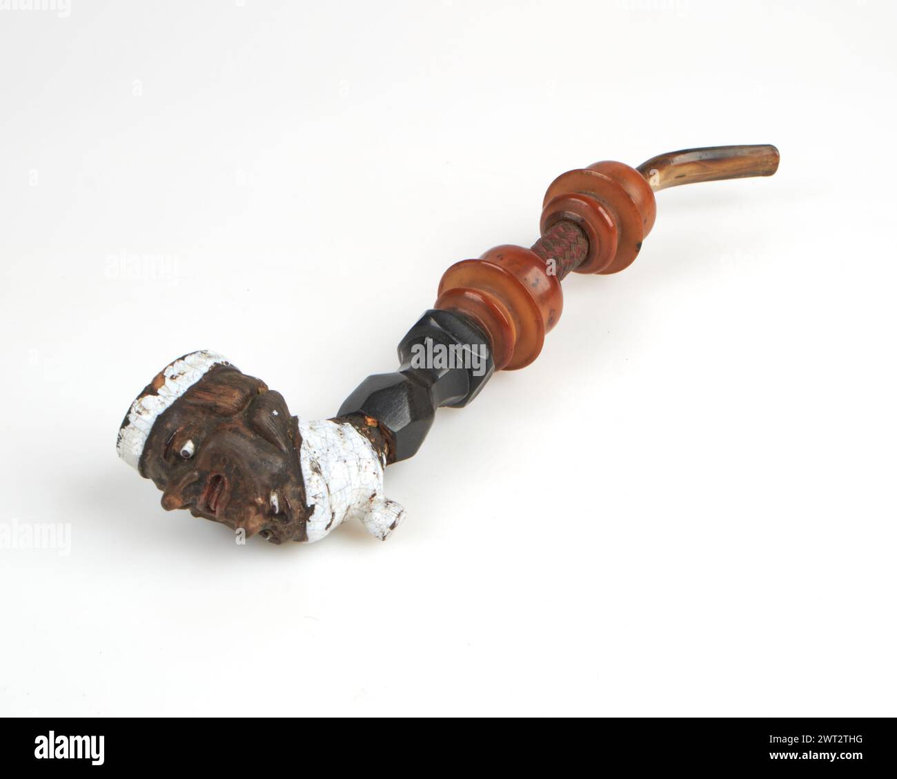 Antique double face enamelled pottery smokers pipe Stock Photo - Alamy