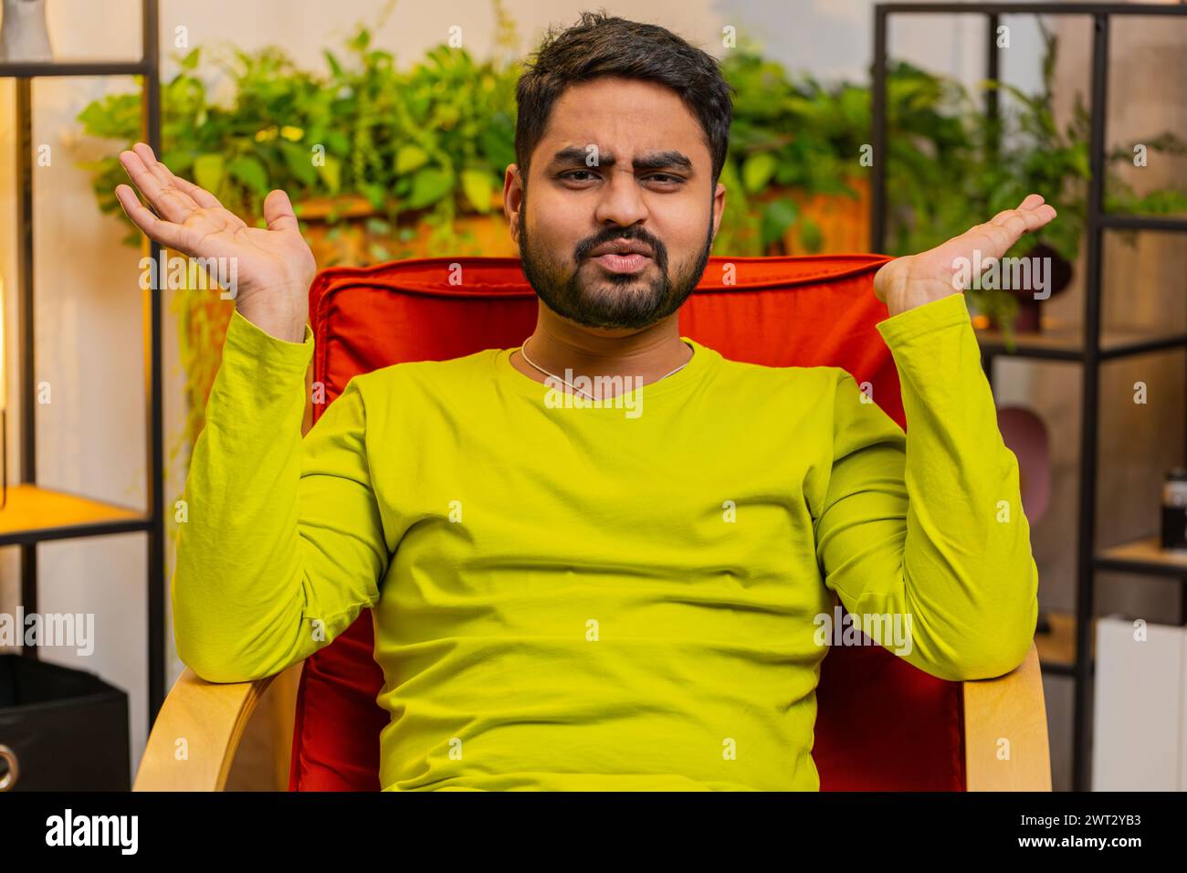 What. Why. Frustrated Indian man raising hands in indignant expression ...