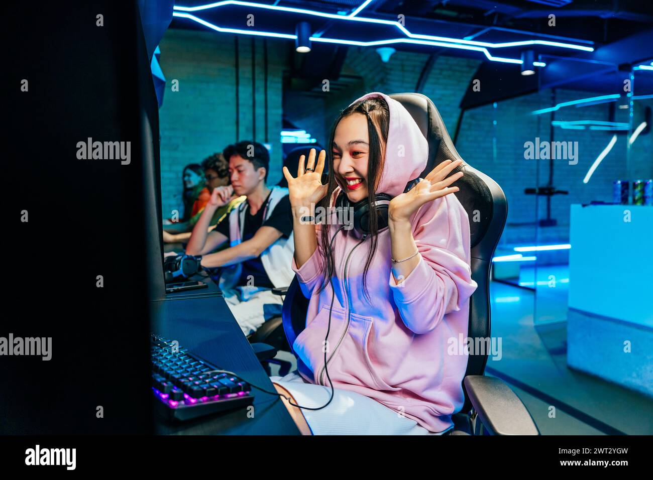 Multiethnic group of young friends playing videogames - Team of ...