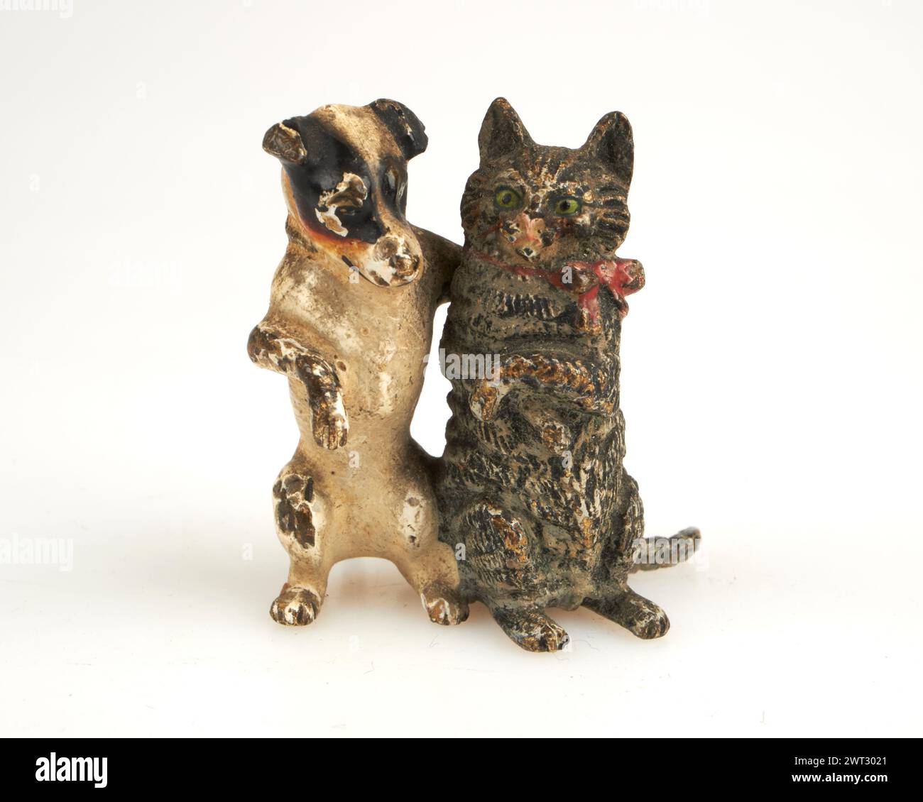 Antique 1900s cold painted miniature cat and dog hi-res stock ...