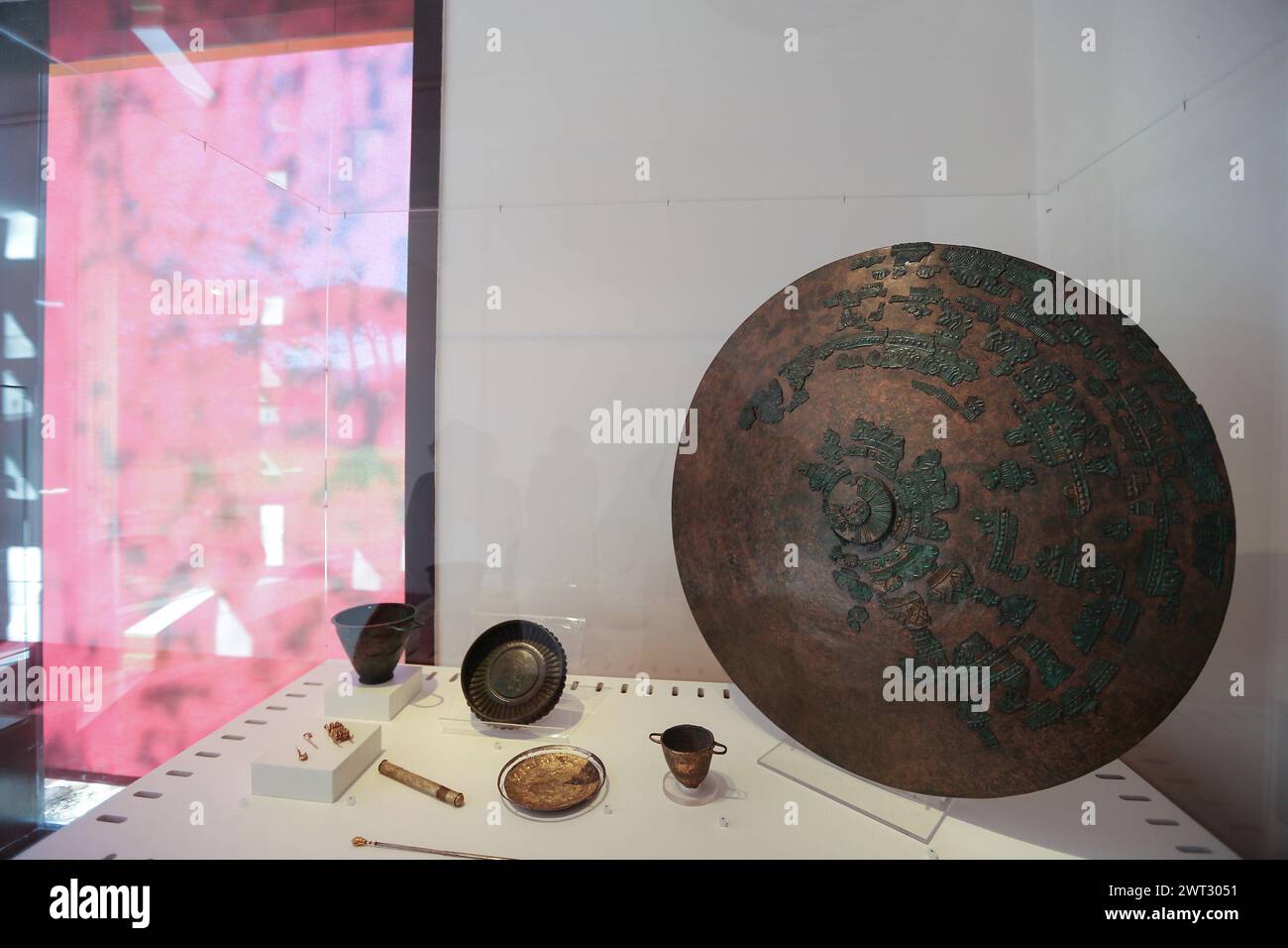 Etruscan objects and a shield exhibited in Pompeii during the ...