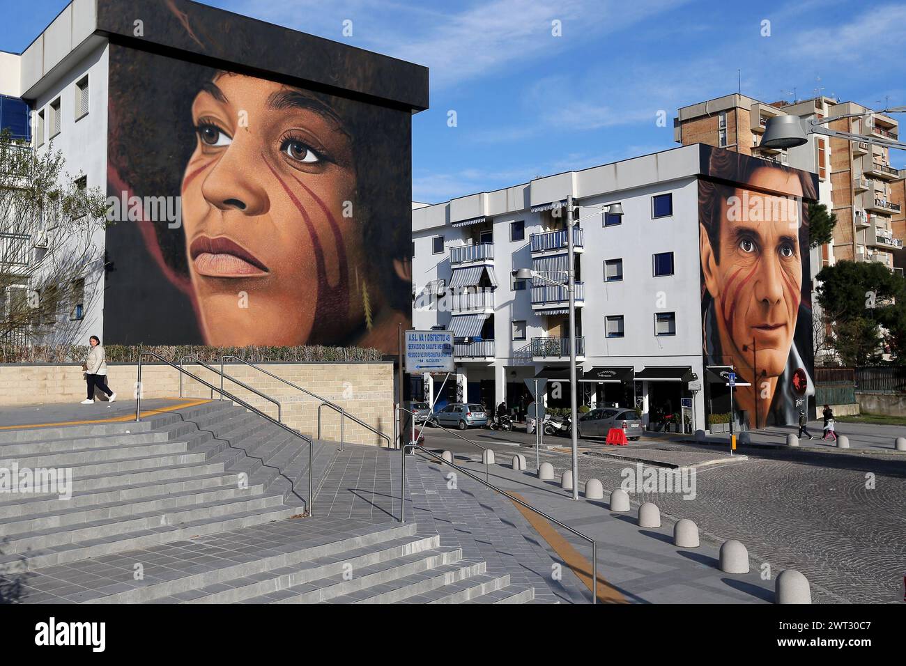 Two giant murals by the street artist Jorit Agoch, depicting Angela ...