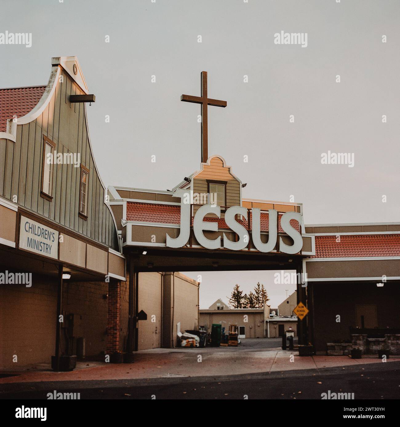 Cross and Jesus on building Stock Photo - Alamy