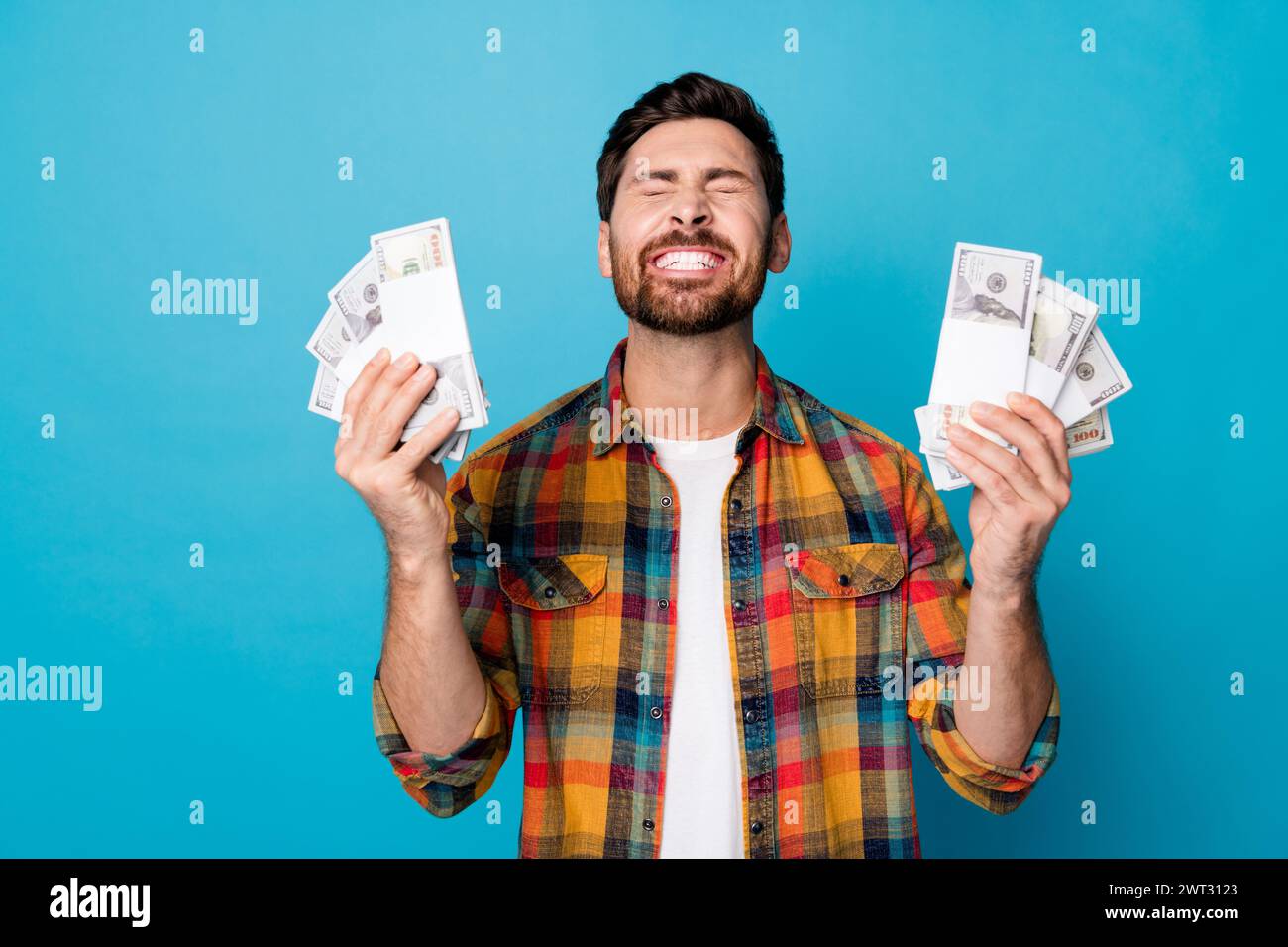 Photo of ecstatic satisfied man with beard dressed plaid shirt hold ...
