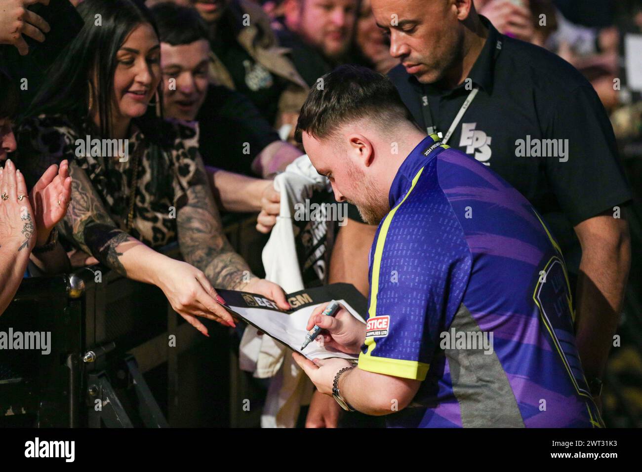 Nottingham, UK. 14th Mar, 2024. Luke Littler walk on with fans signs ...