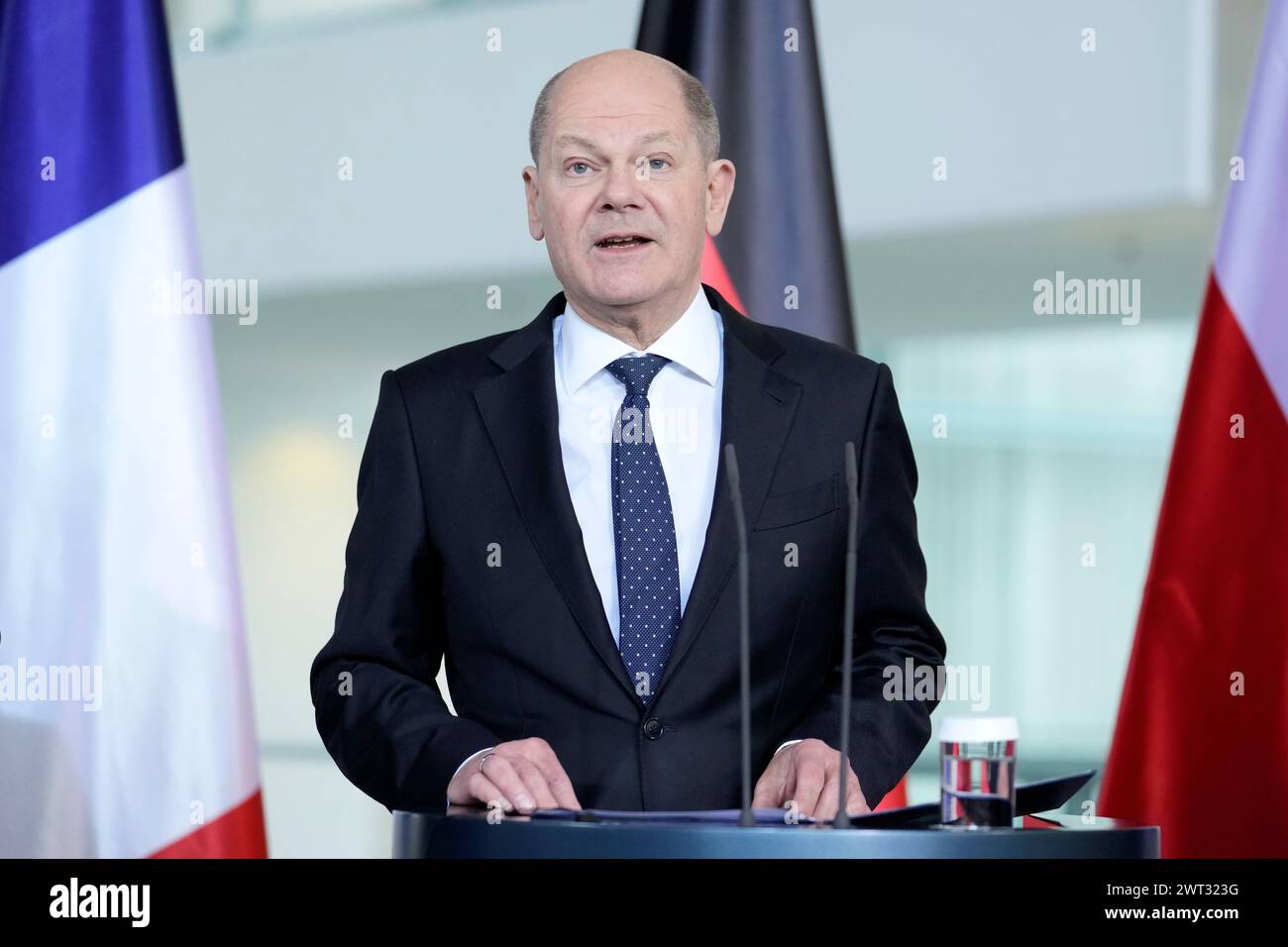 German Chancellor Olaf Scholz talks to the media at a press conference ...