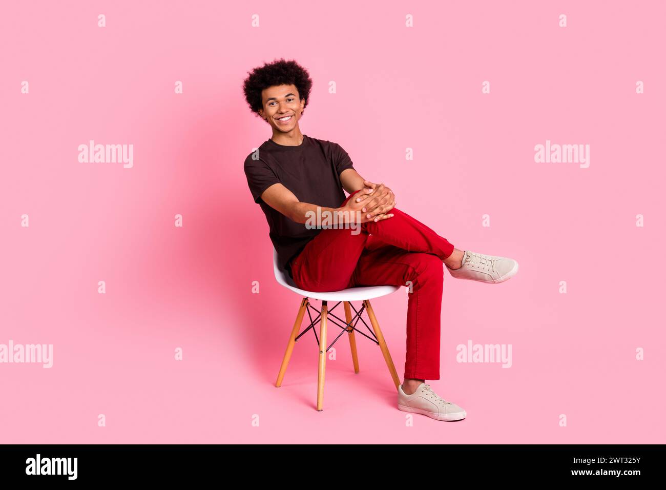 Full length body photo of young funny man in casual outfit sitting ...