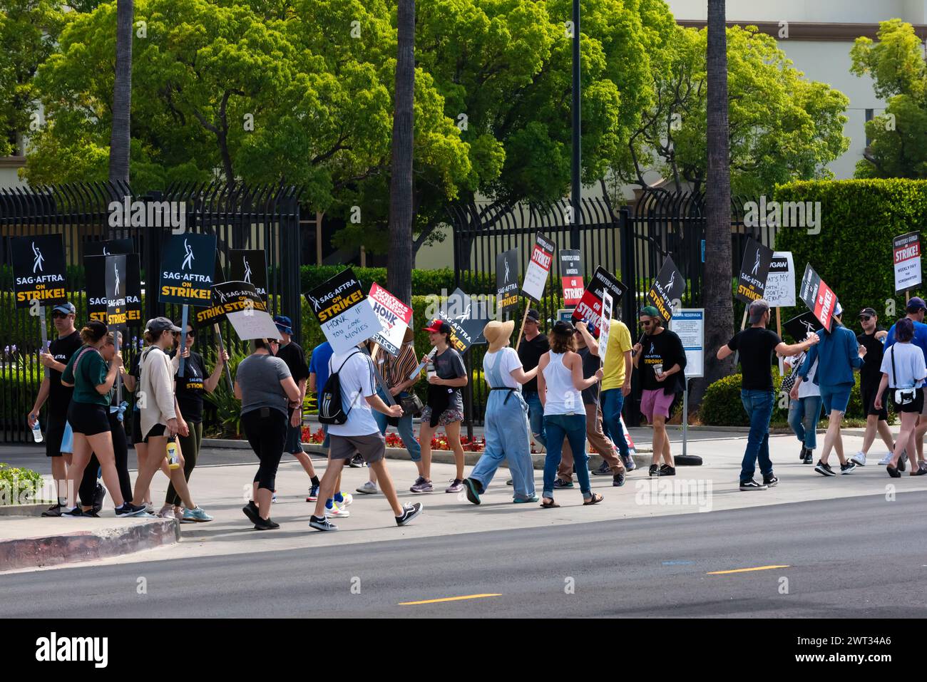 A wide-angle of the picket line during the writers and actors strike in ...