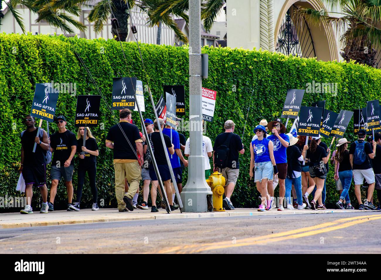 A wide-angle of the picket line during the writers and actors strike in ...