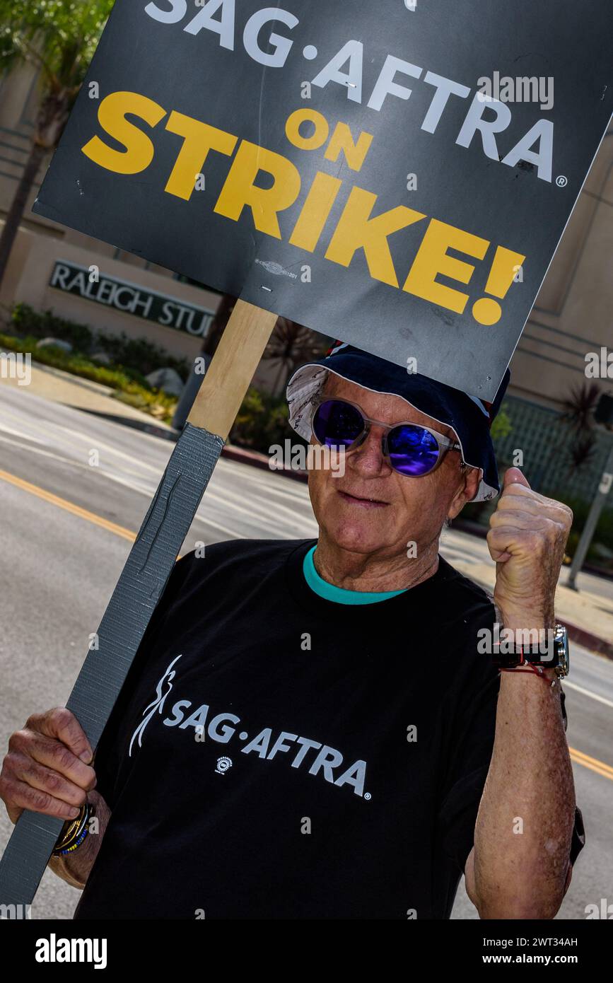 Actor Edward Blinn holds picket sign July 14, 2023, Hollywood strike ...