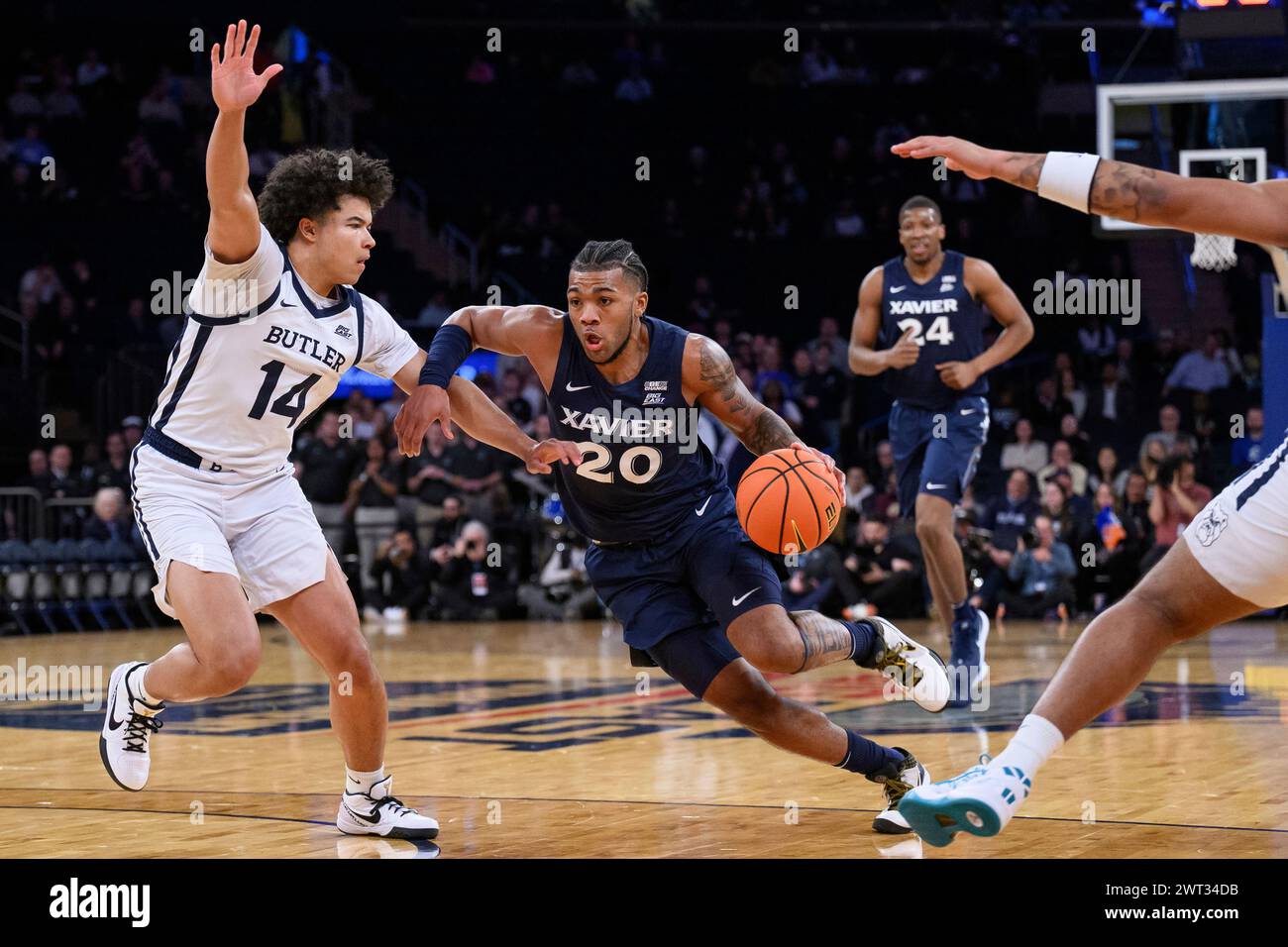 NEW YORK, NY - MARCH 13: Xavier Musketeers guard Dayvion McKnight (20 ...