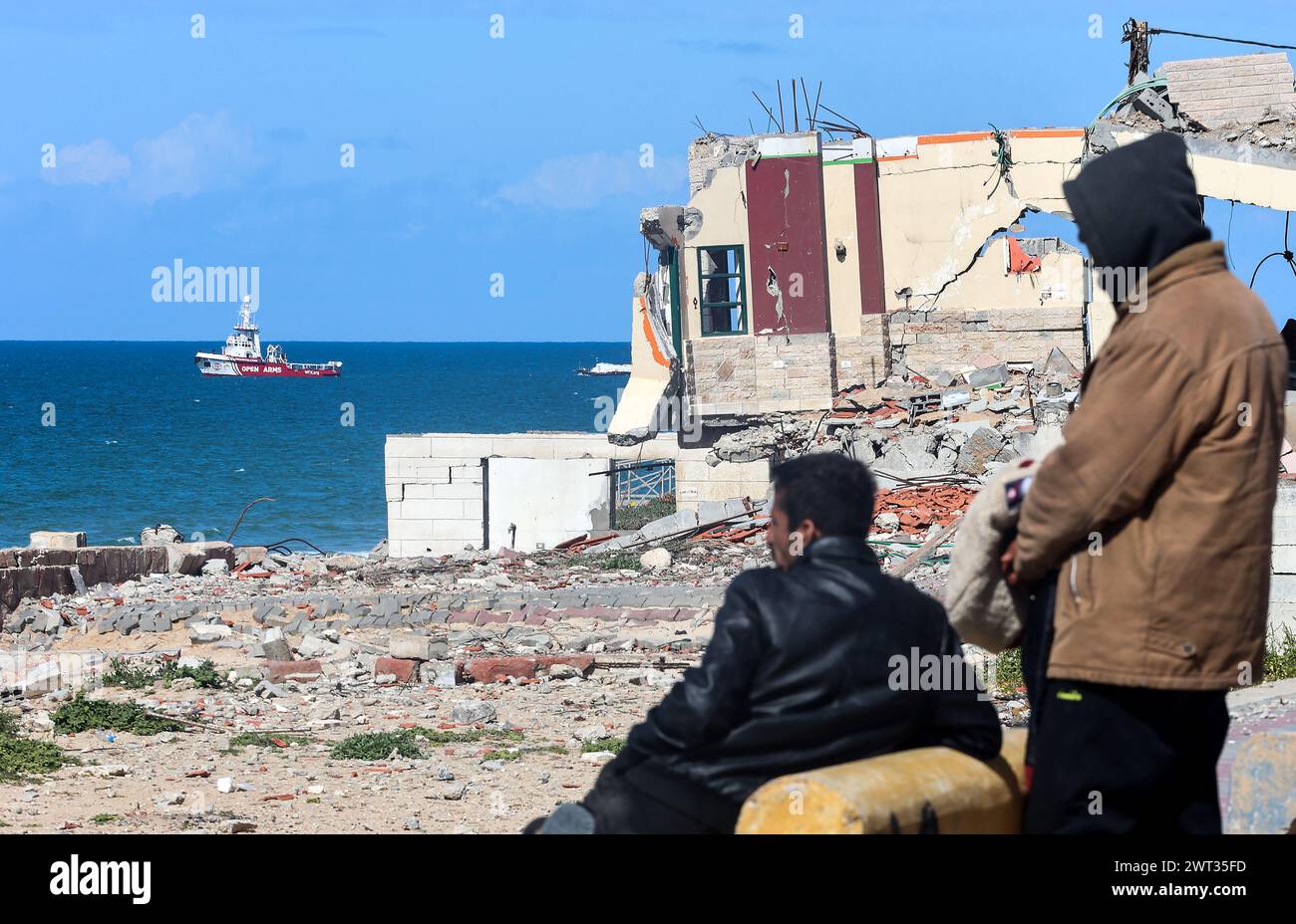 Gaza, Gaza. 15th Mar, 2024. Palestinian men watch The Open Arms ...