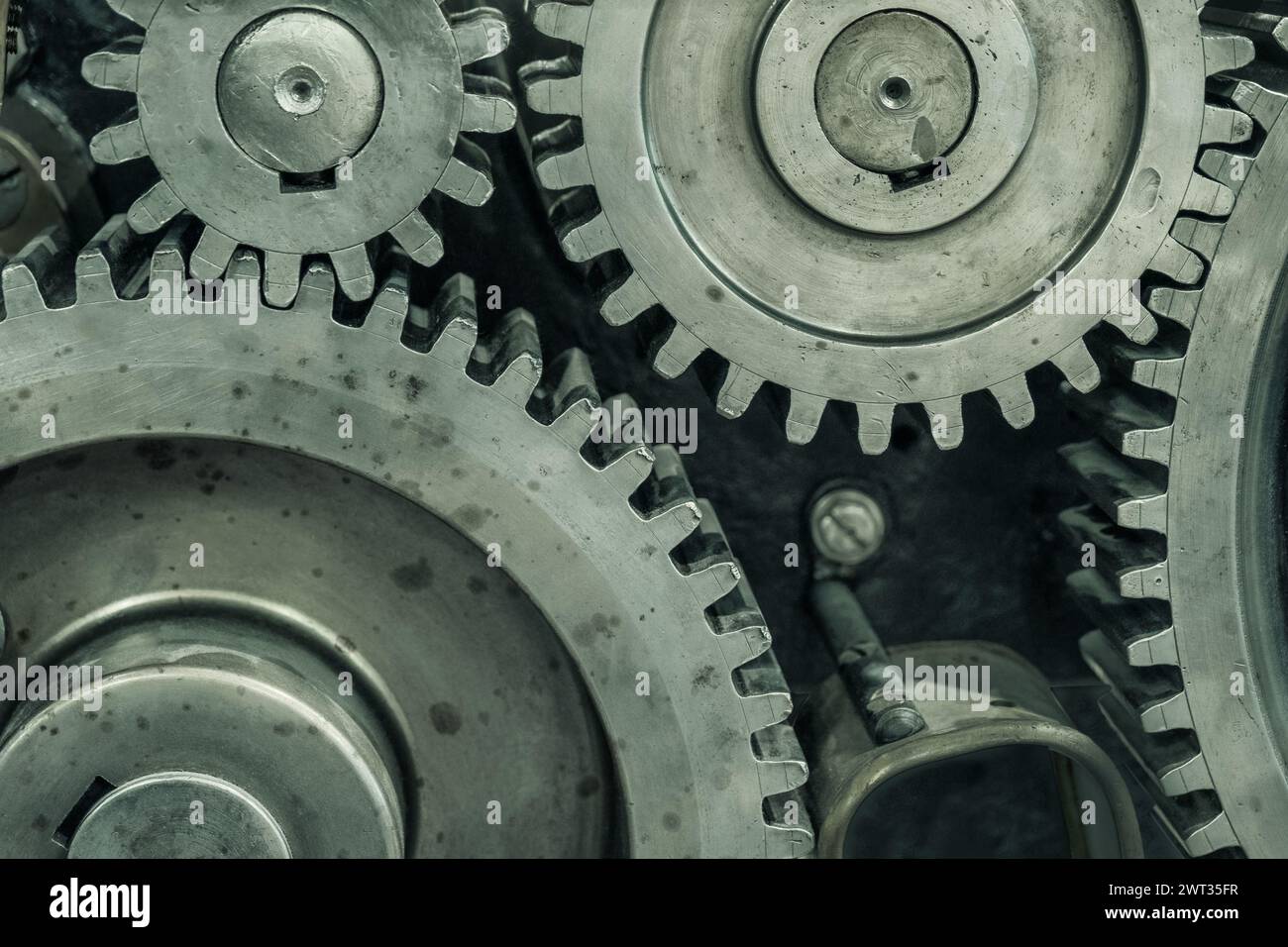 old steel gears close up background Stock Photo - Alamy