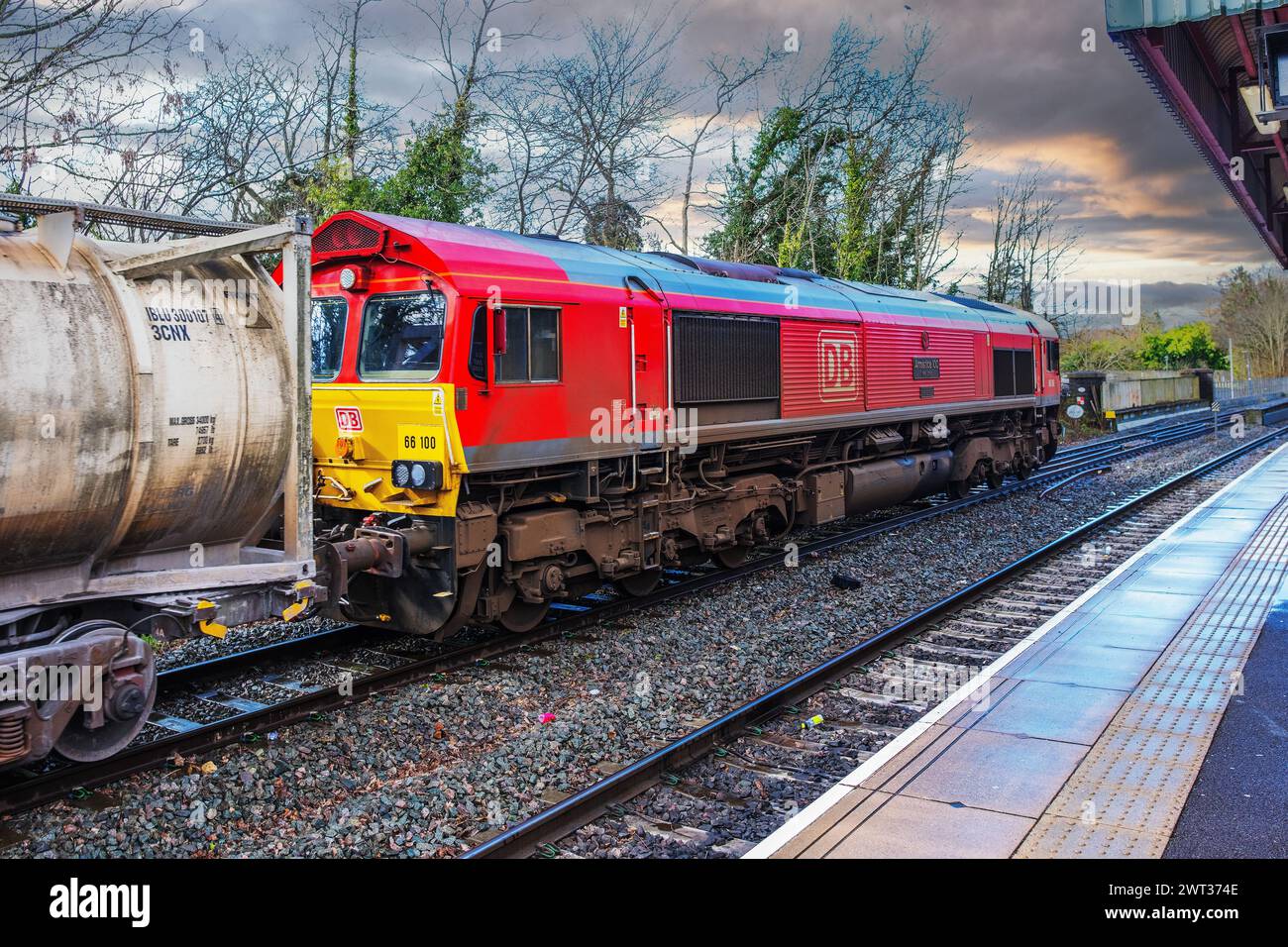 Diesel powered passenger commuter railway train and station. West ...
