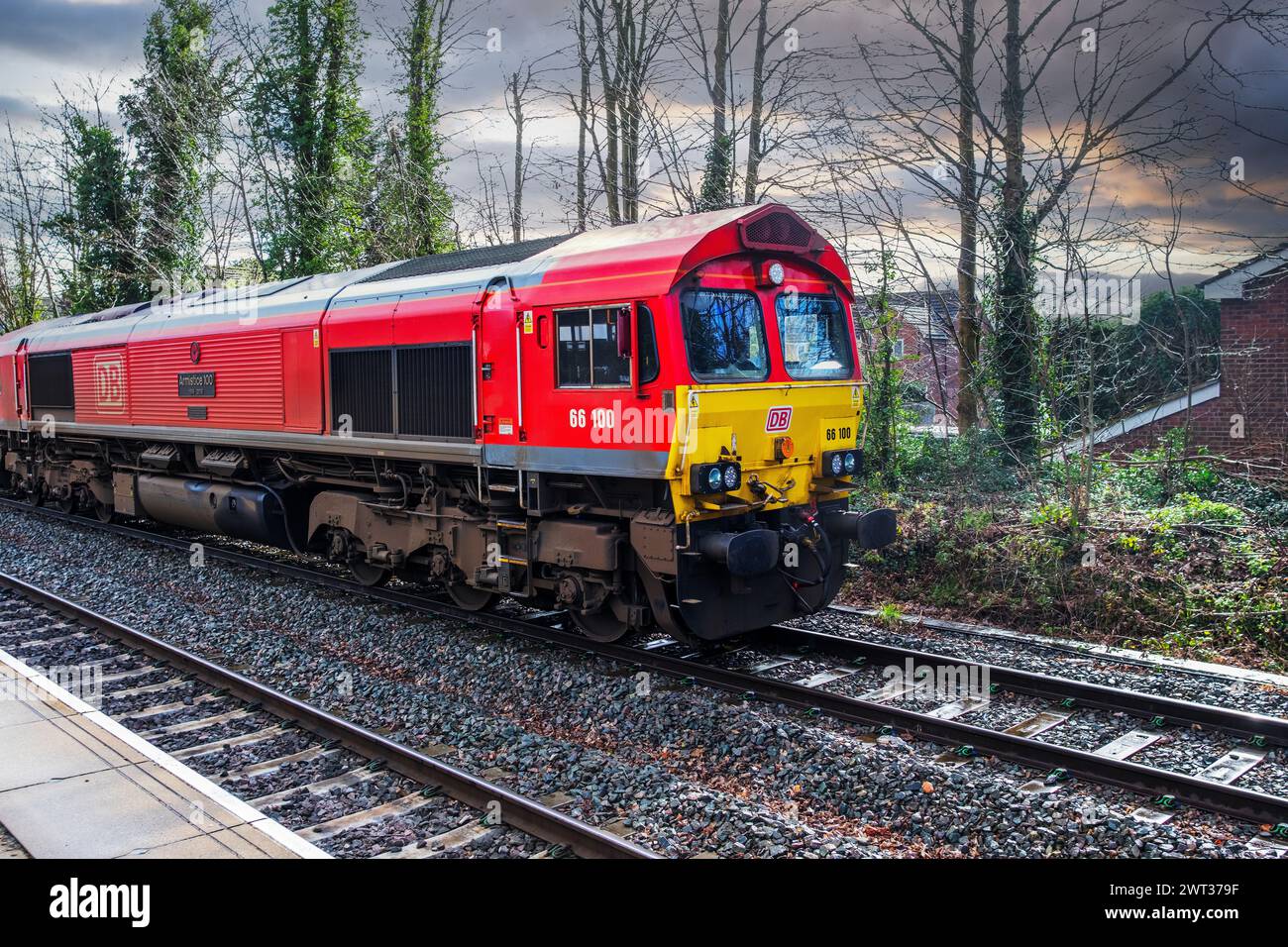 Diesel powered passenger commuter railway train and station. West ...