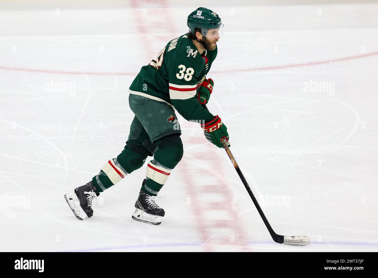 Minnesota Wild right wing Ryan Hartman (38) advances the puck against ...