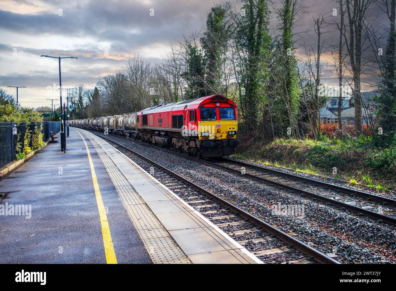 Diesel powered passenger commuter railway train and station. West ...
