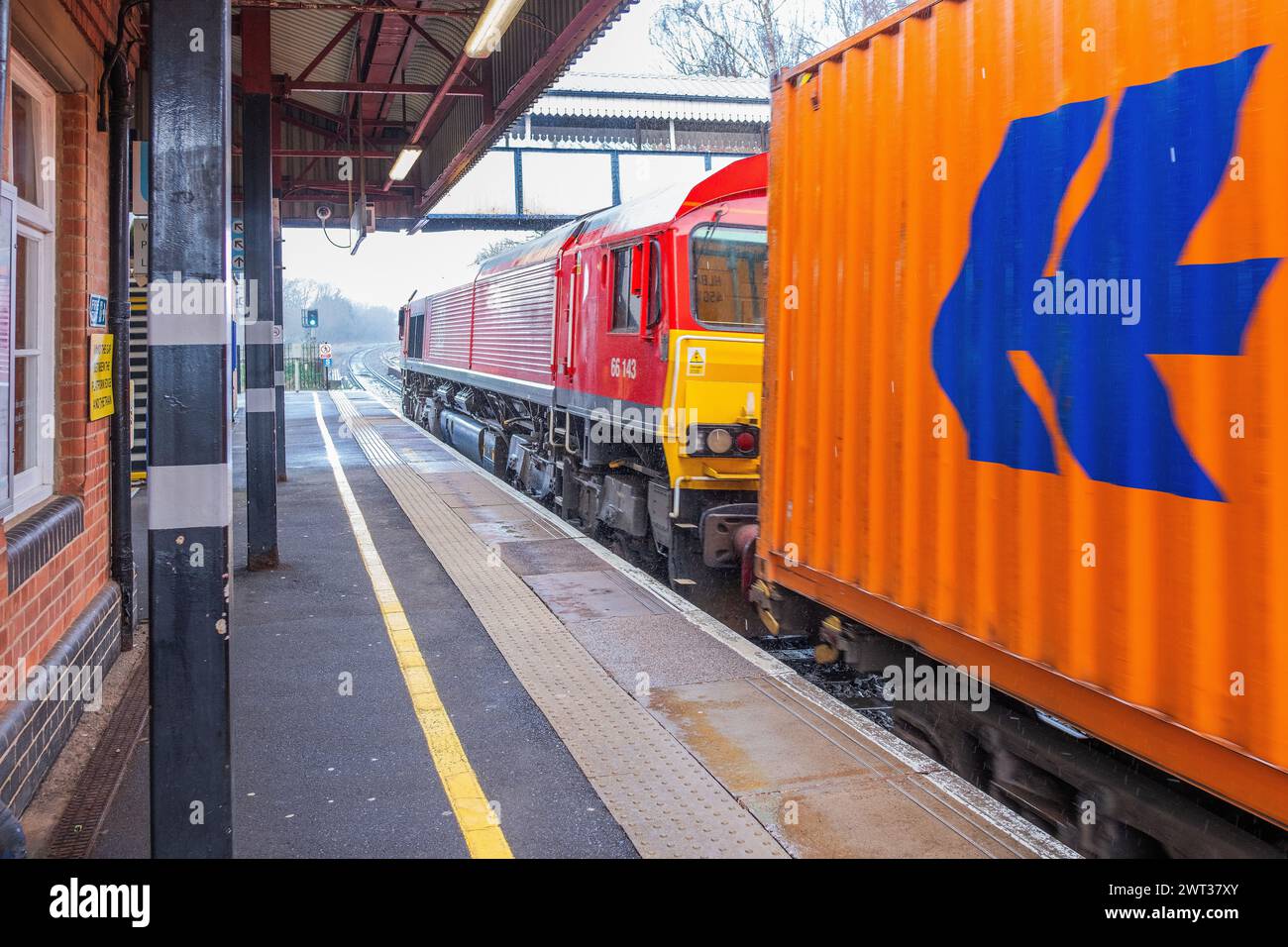 Diesel powered passenger commuter railway train and station. West ...