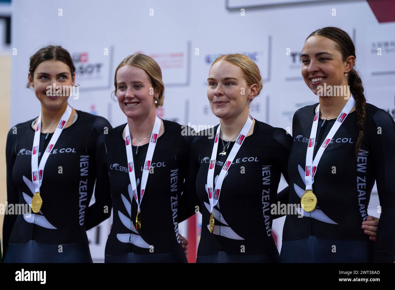 Team New Zealand poses for photographs with their gold medals during ...