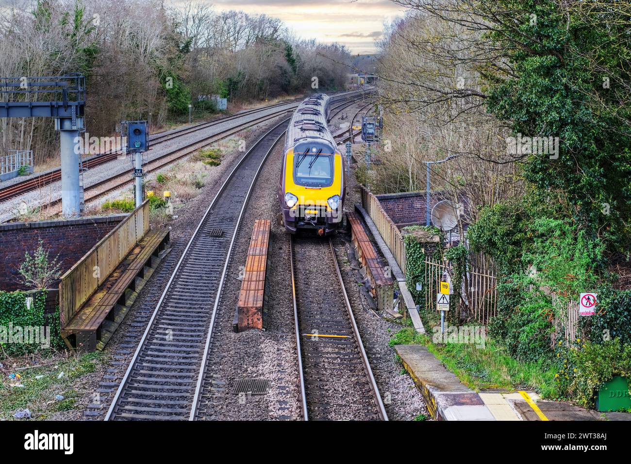 Diesel powered passenger commuter railway train and station. West ...