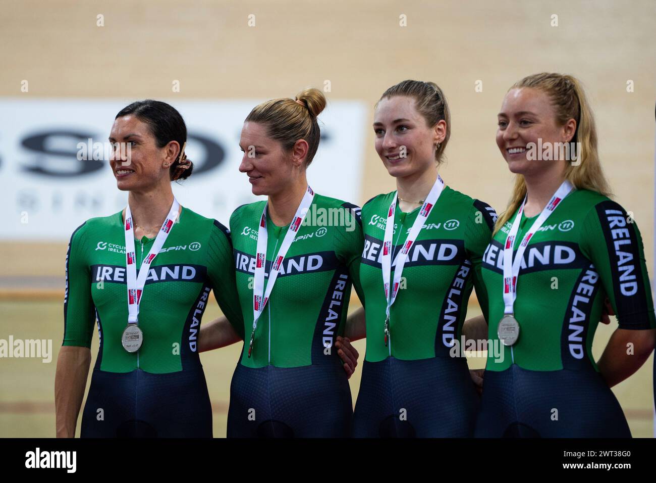 Team Ireland poses for photographs with their silver medals during the ...