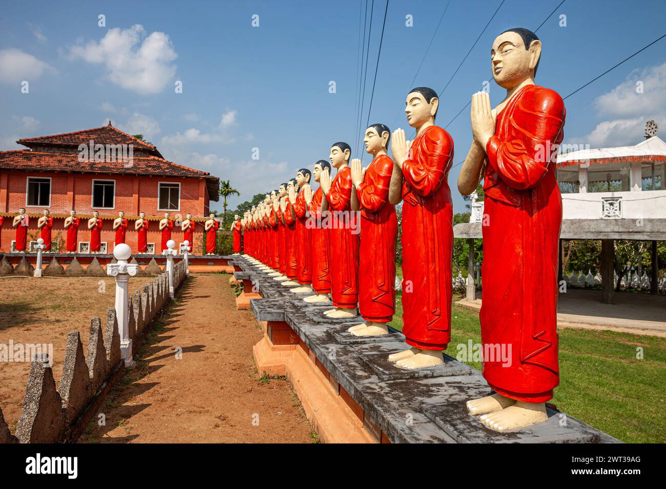 Sri Lanka, Sigiriya, Buddhist Temple with multiple statues Stock Photo ...