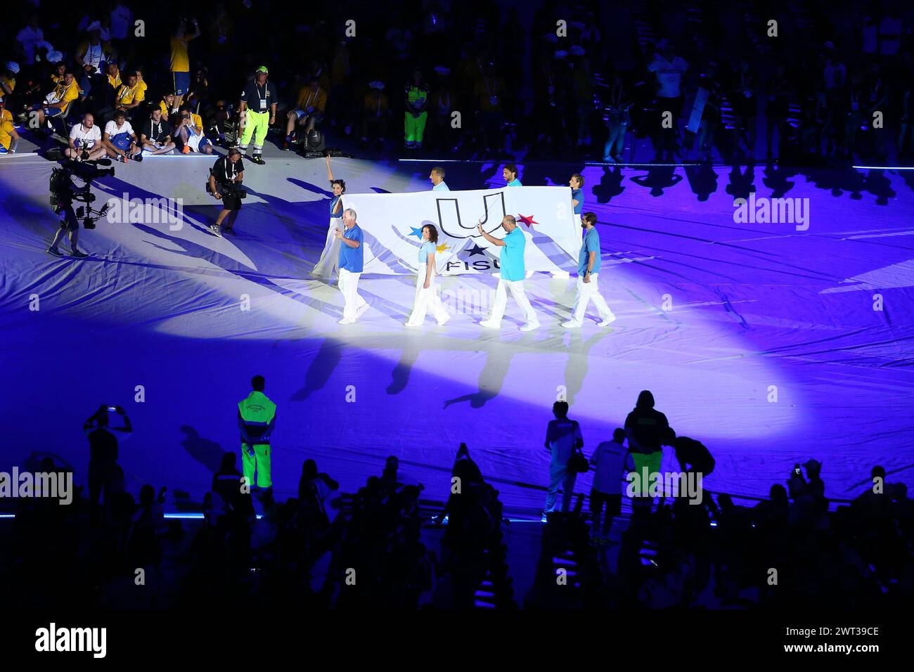 Some athletes carry the FISU flag during the opening ceremony of the ...