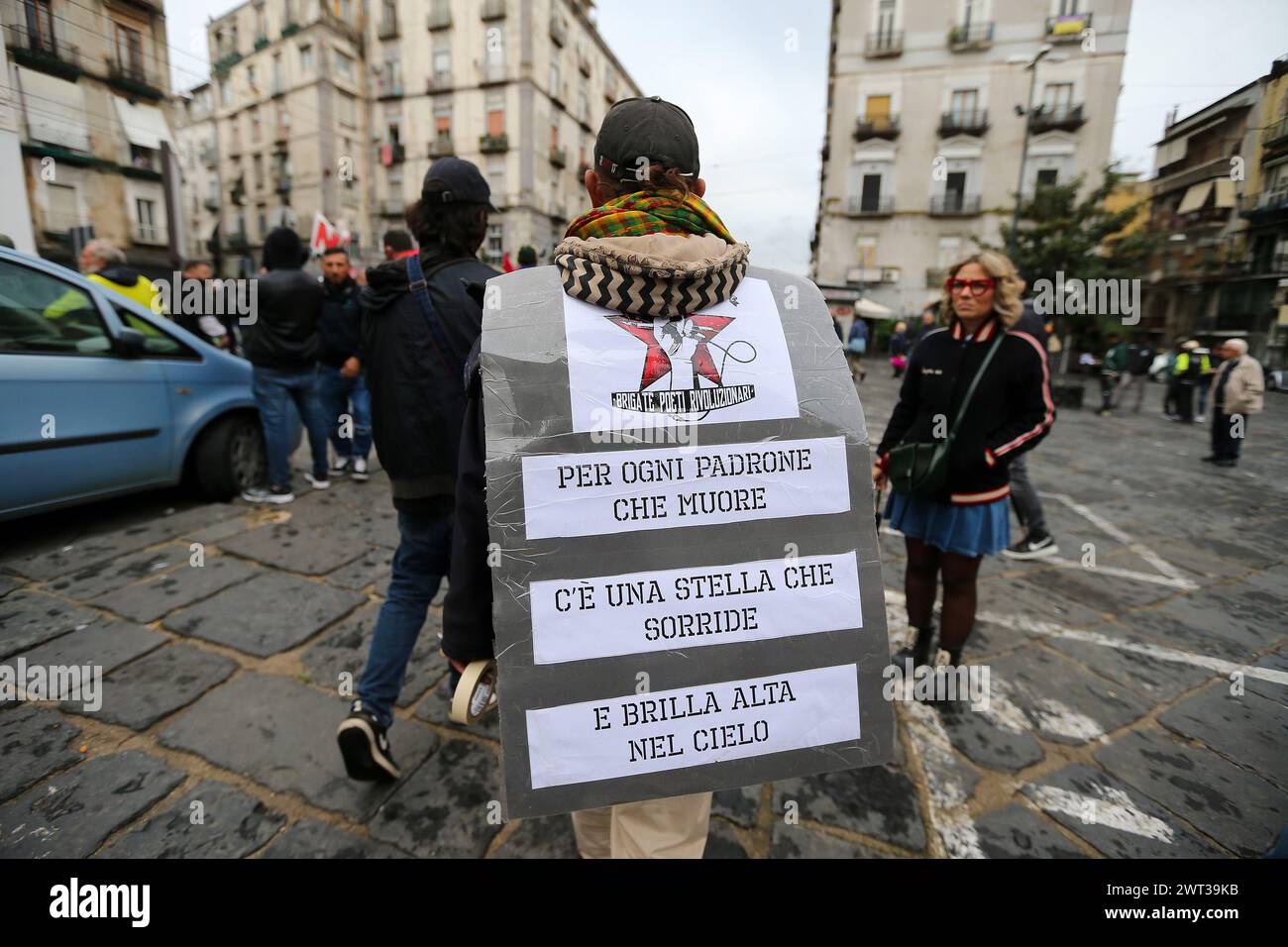 A man with a placard, during the demonstration in Naples "We Rise Up ...