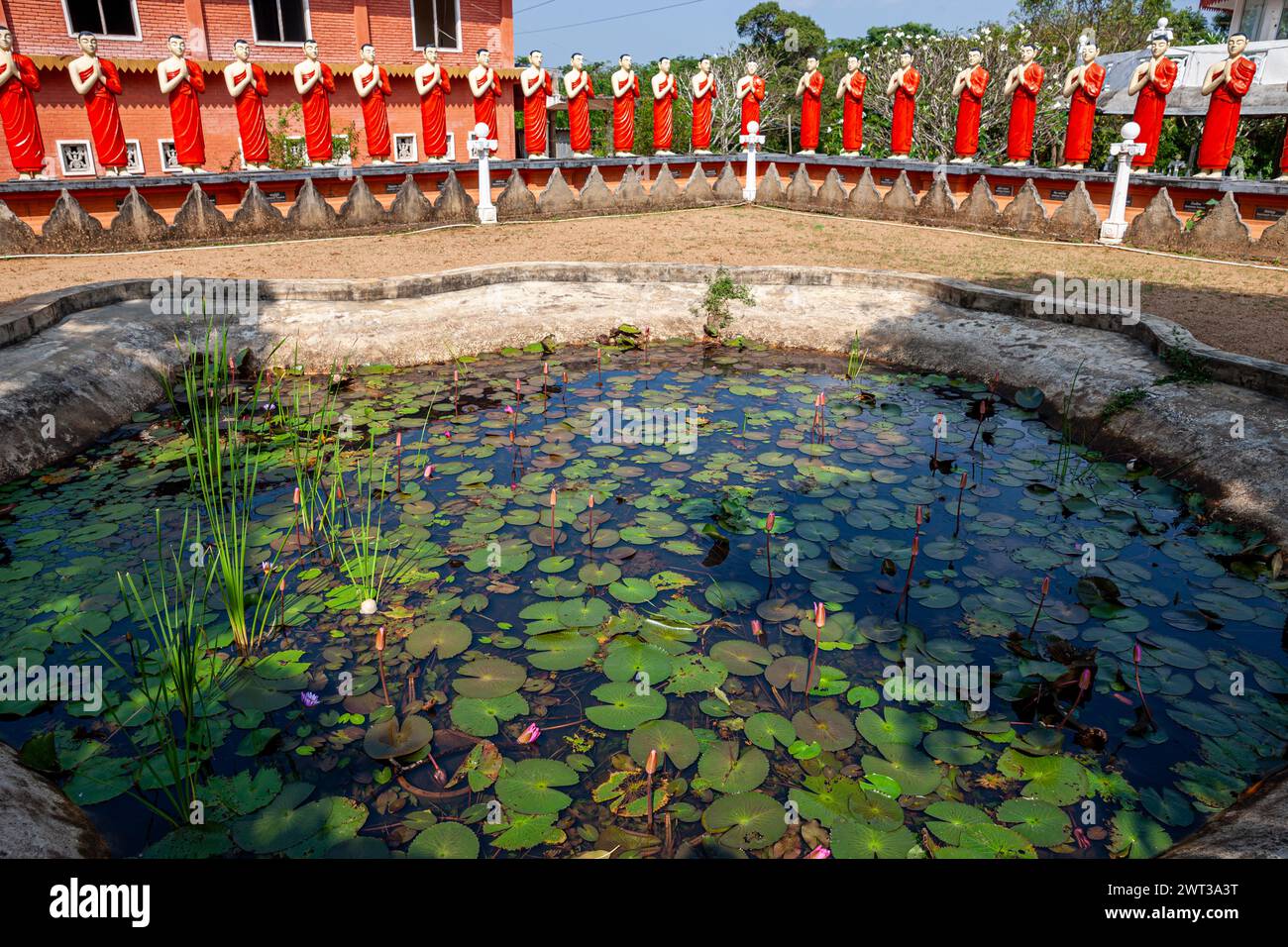 Sri Lanka, Sigiriya, Buddhist Temple with multiple statues Stock Photo ...