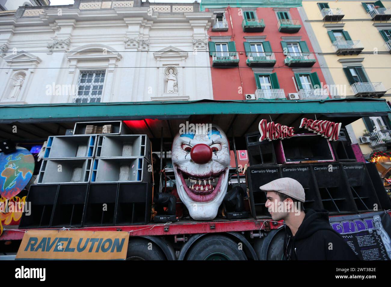 A truck full of loudspeakers and with a giant Joker mask, during the ...
