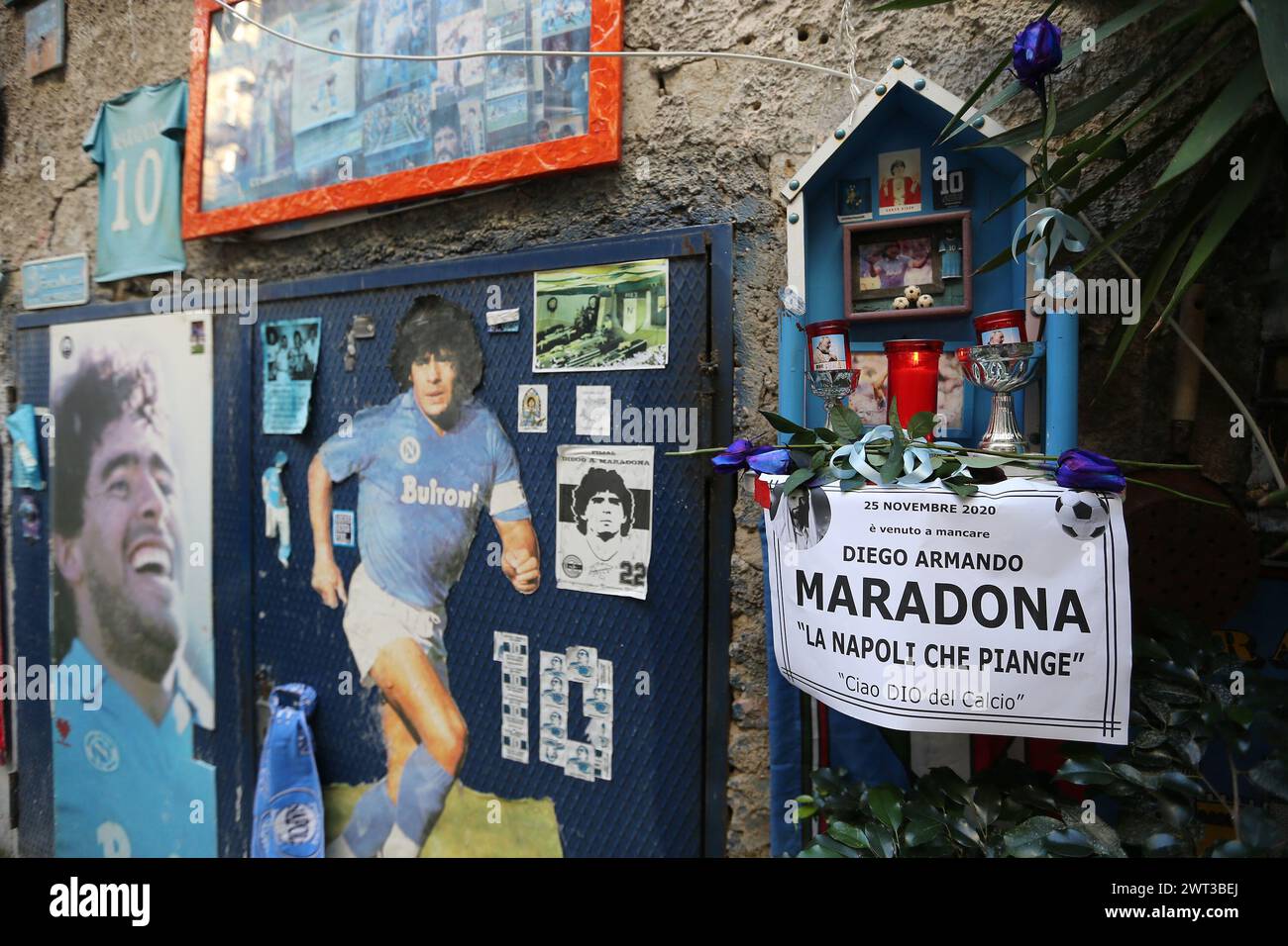 An altar, with the funeral poster of Diego Armando Maradona, in the ...