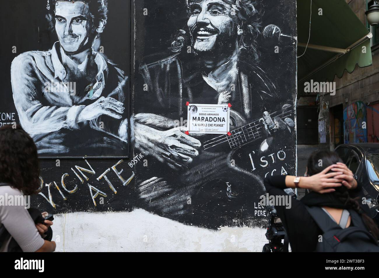 A mural with the actor Massimo Troisi and the musician Pino Daniele ...
