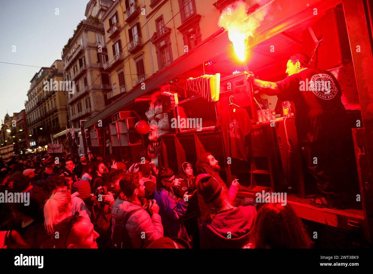 People dance and sing on a truck, with a smoke bomb, during the ...
