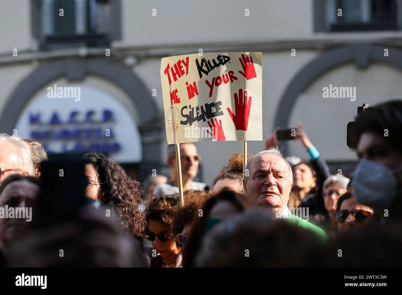 People with placards, during the protest and solidarity rally with the ...