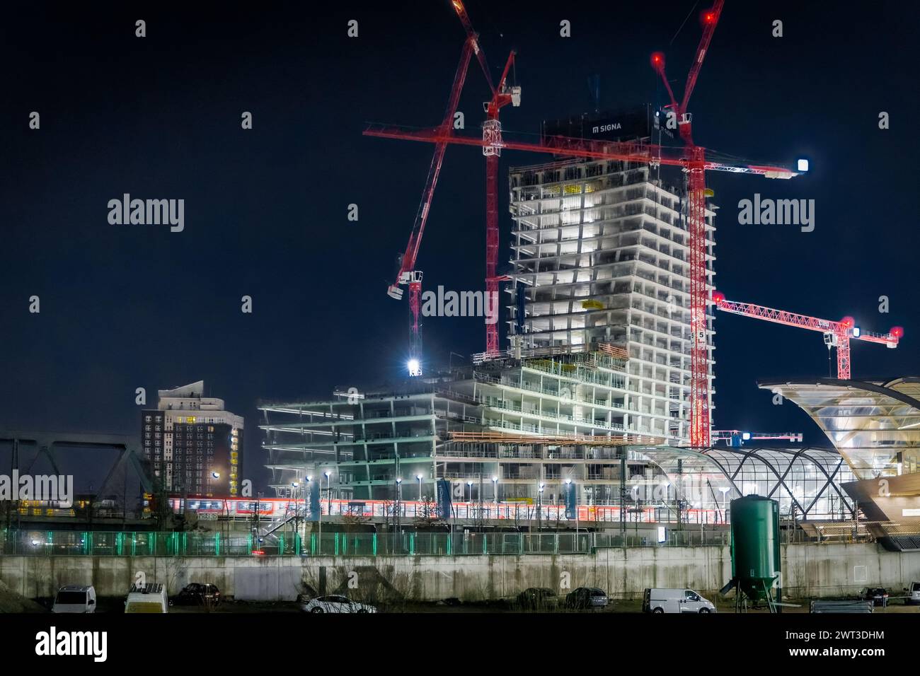 Hamburg, Germany. 14th Mar, 2024. Night-time view of the Elbtower ...