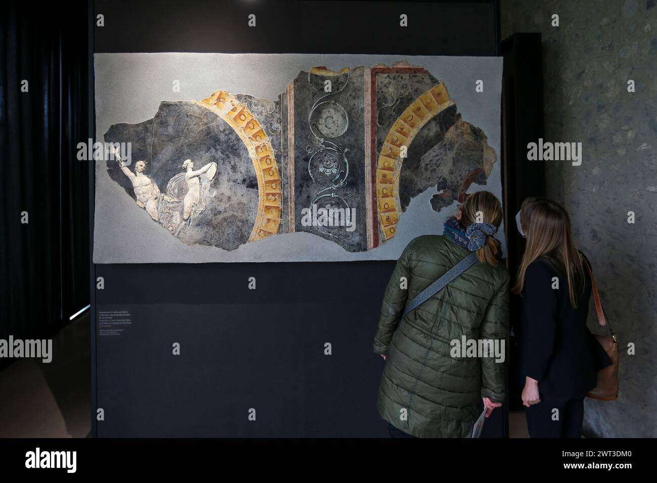 Two women look at a fresco in the exhibition "Art and Sensuality in the ...