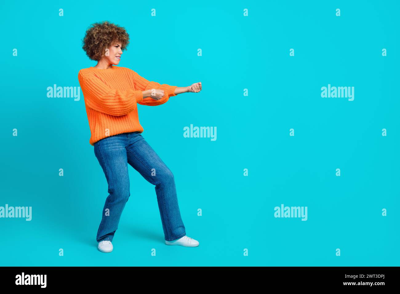 Full length profile photo of hardworking srong woman arms hold pull ...