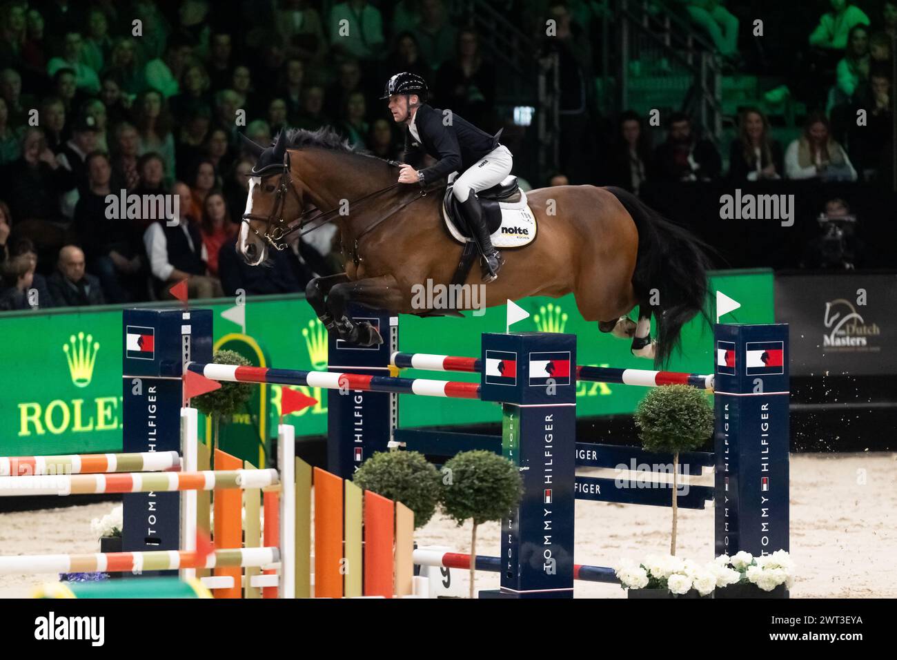 Denbosch, Netherlands - March 10, 2024. Marcus Ehning of Germany and ...