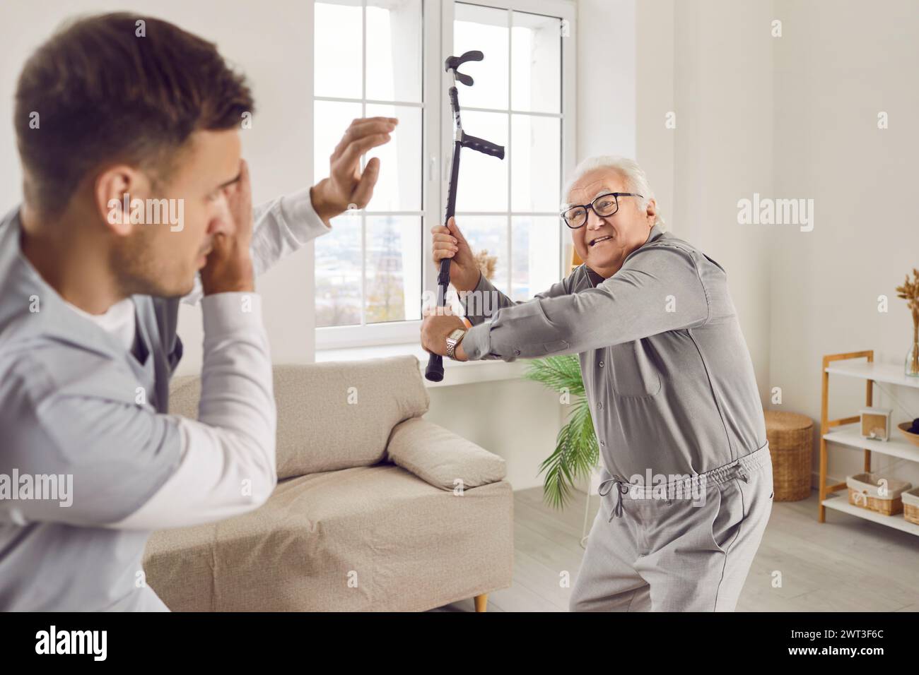 Nurse and angry patient at home hi-res stock photography and images - Alamy