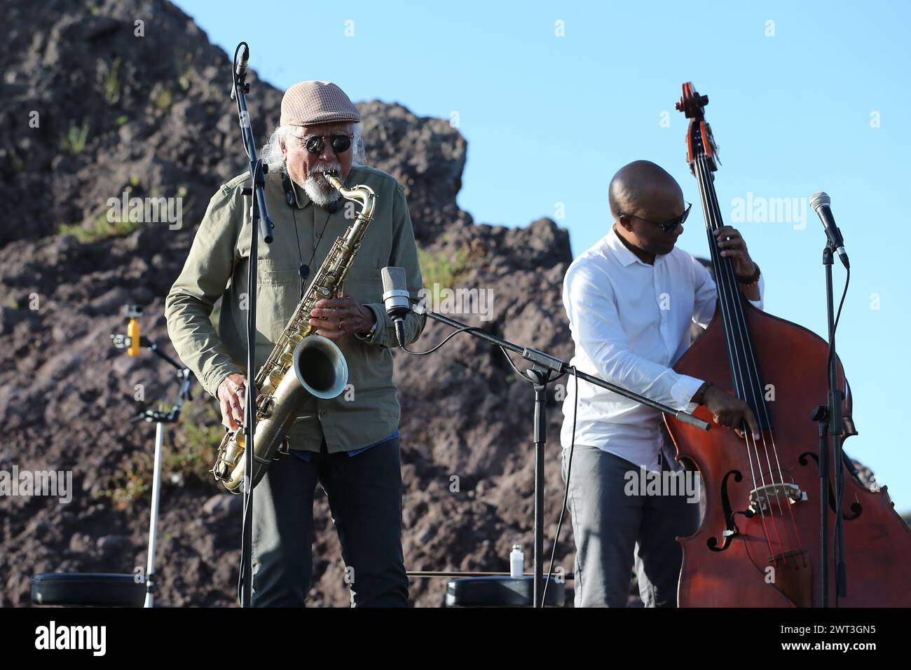 The jazz saxophonist, Charles Lloyd, with bassist Reuben Rogers, during ...