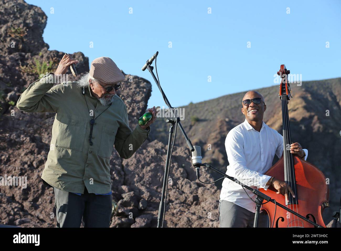 The jazz saxophonist, Charles Lloyd, with the maracas, with bassist ...