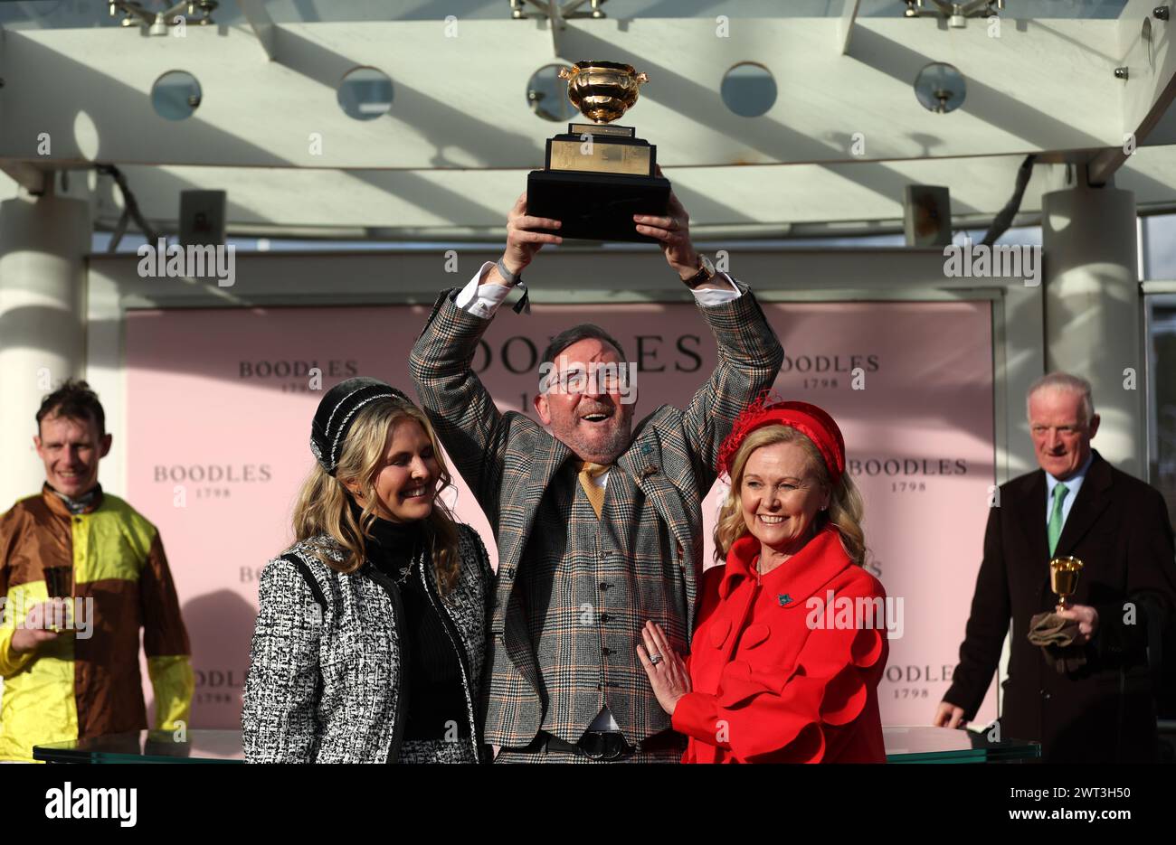 Sarah Turley, Greg Turley, and owner Audrey Turley with the trophy ...