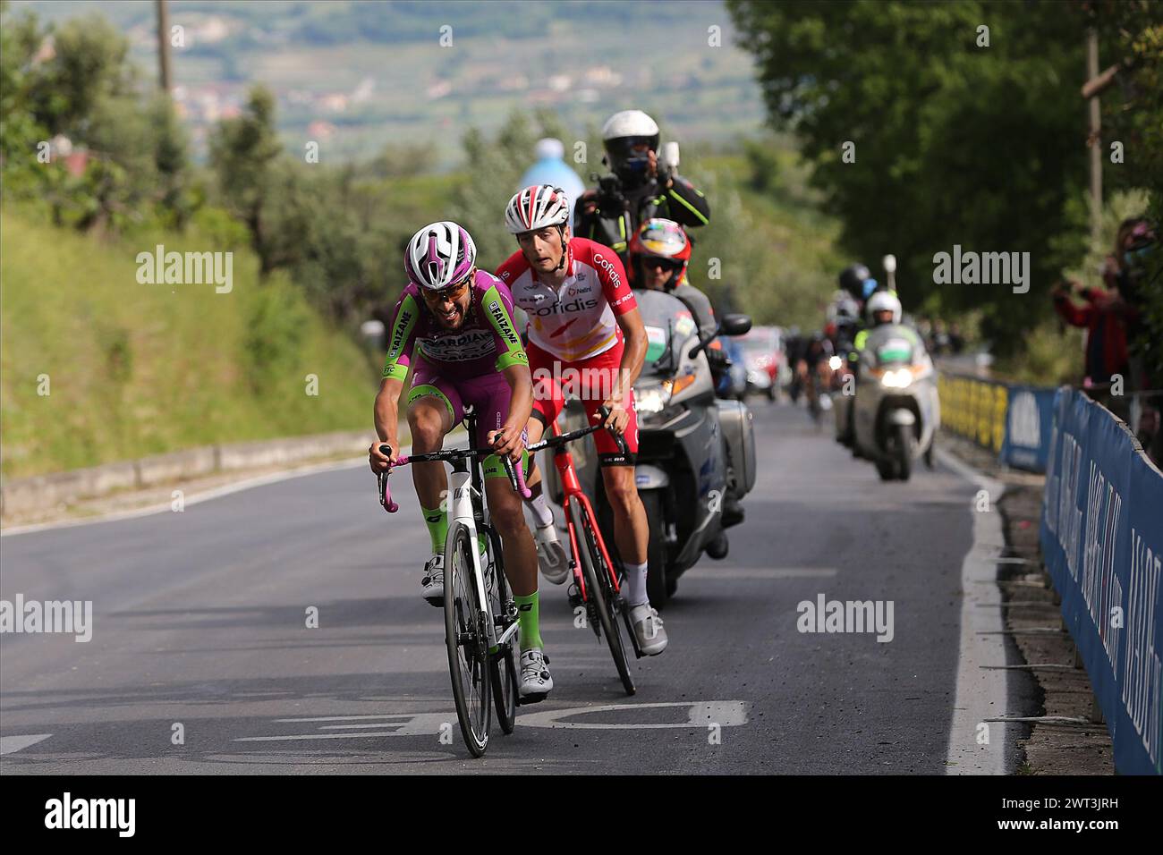The cyclist Victor Lafay, of the Cofidis Team, rear the cyclist Giovanni Carboni, of the ...