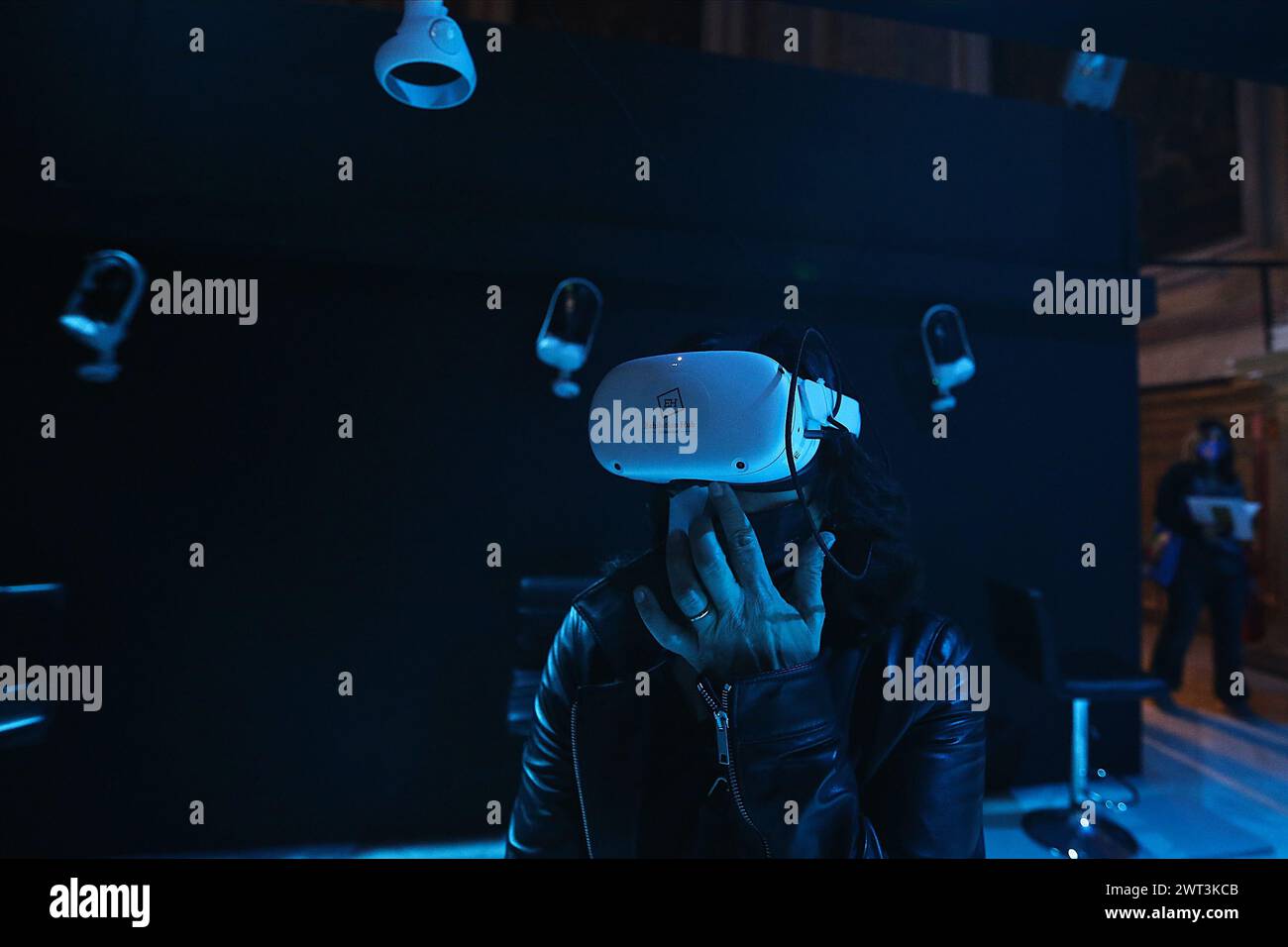 A visitor, with a mask to protect himself from Covid-19, with virtual ...