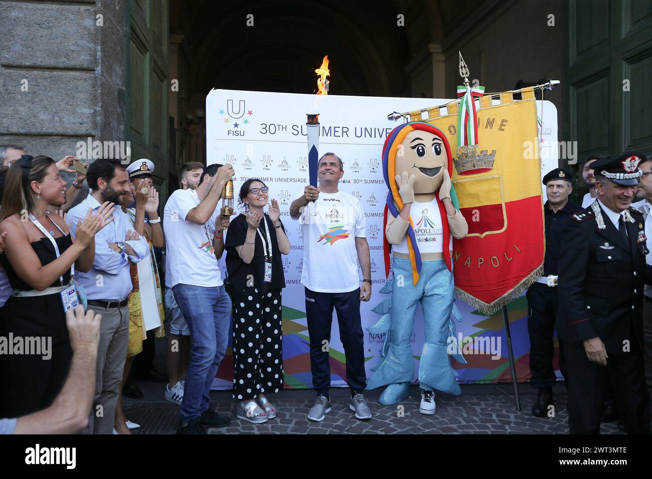 The mayor of Naples, Luigi de Magistris, lights the torch of the 2019 ...