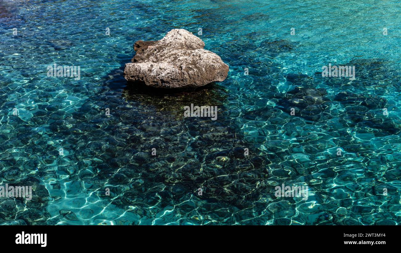 San Pedro Rock, turquoise waters in Cala Petita, Porto Cristo, coast of ...